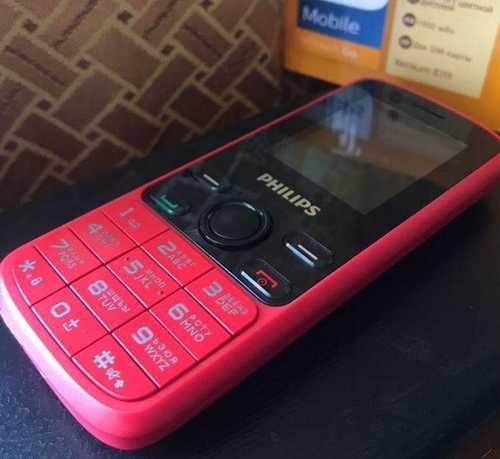 Сотовый телефон Philips Xenium E111 красный