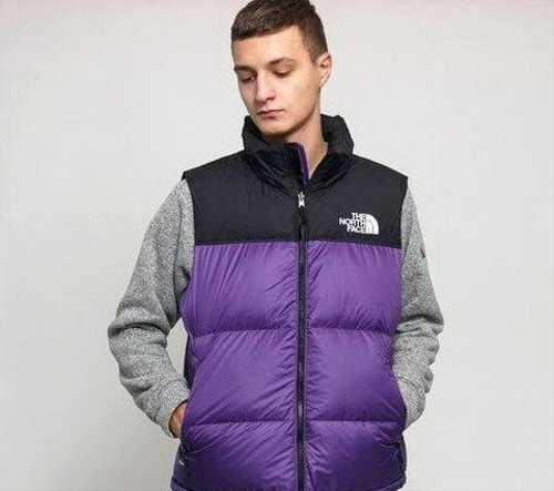 Жилетки The North Face разные цвета