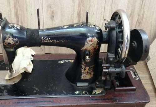 Старинная швейная машинка naumann