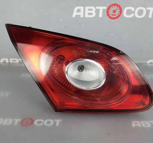Фонарь в крышку багажника левый VW Passat CC (200