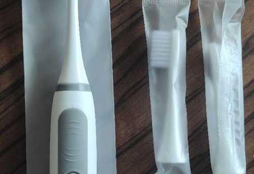 Электронная зубная щетка