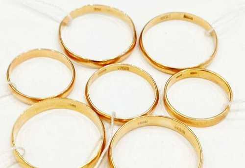 Золотые деформированные обручальные кольца 585 про