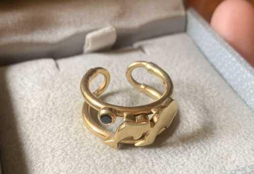 Золотое кольцо с дельфинами и синим сапфиром
