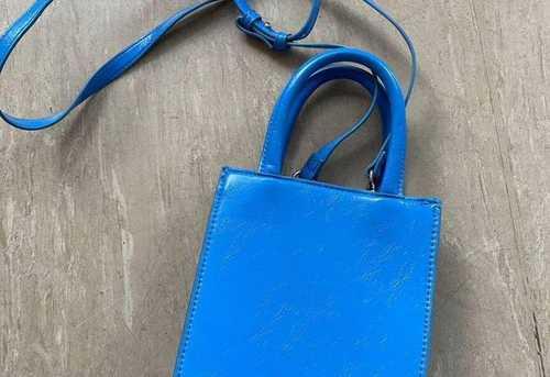 Маленькая синяя сумка