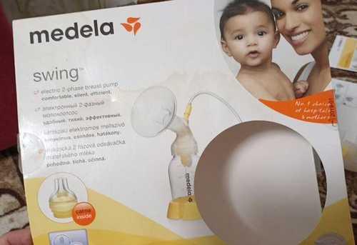 Молокоотсос medela swing электрический