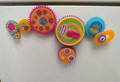 Развивающие игрушки Tomy колесики