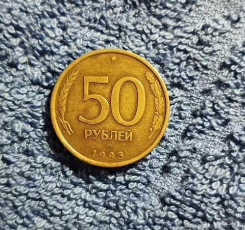Монета