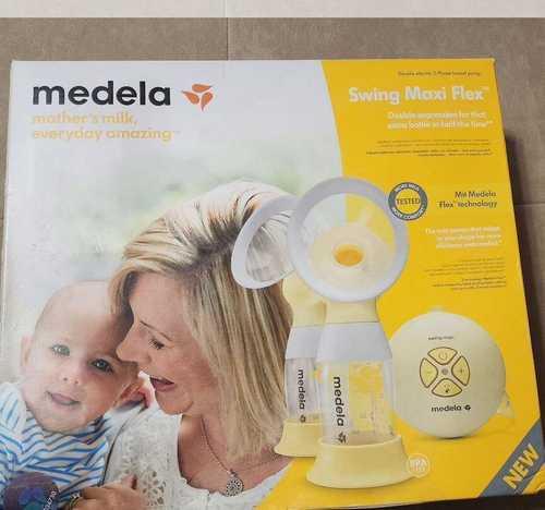 Молокоотсос электрический двойной medela