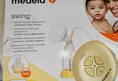 Молокоотсос medela swing электрический