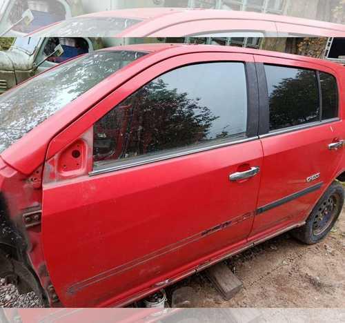 Дверь передняя левая Geely MK cross