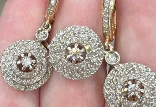 Роскошные золотые серьги и кольцо с бриллиантами