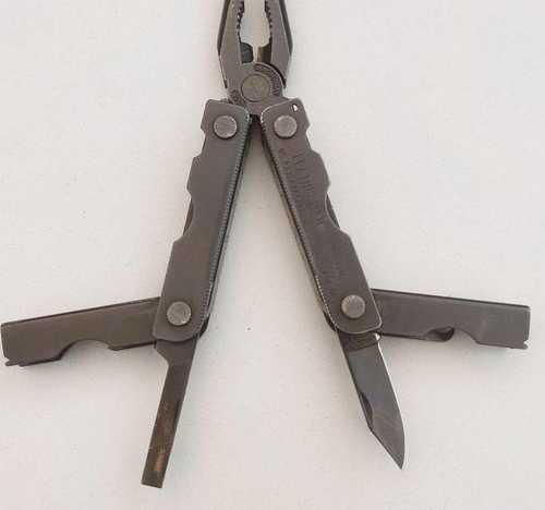 Мультитул leatherman mini tool us pat 4744272