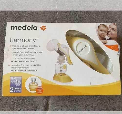 Молокоотсос medela