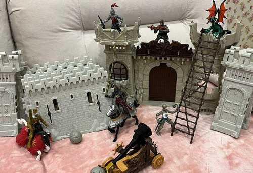 Средневековый замок с драконом и рыцарями