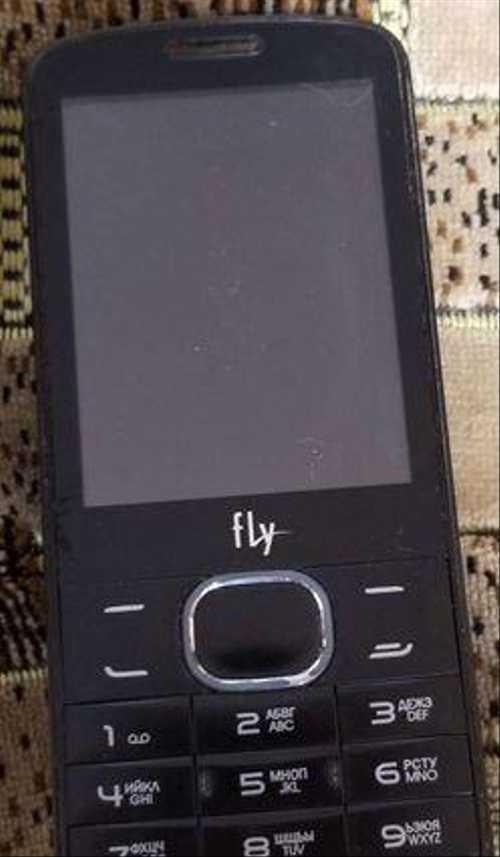 Телефон fly ts111 трехсимочный