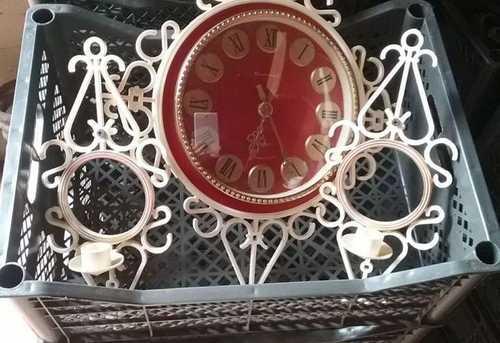 Часы настенные с двумя подставками под свечки