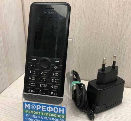 С) Телефон Nokia 107