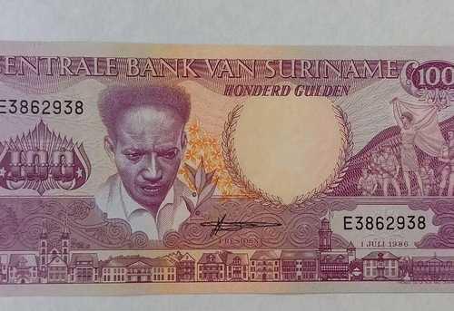 Банкнота. Суринам - 100 гульденов. Птица Тукан