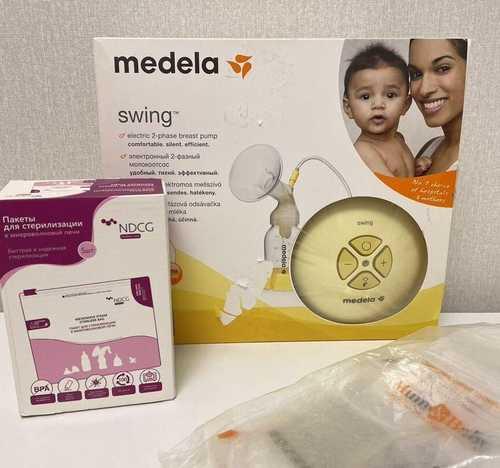 Молокоотсос электрический medela swing