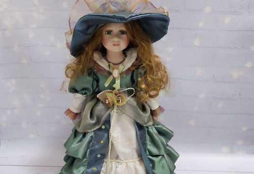 Кукла фарфоровая remeco в шляпе 42 см