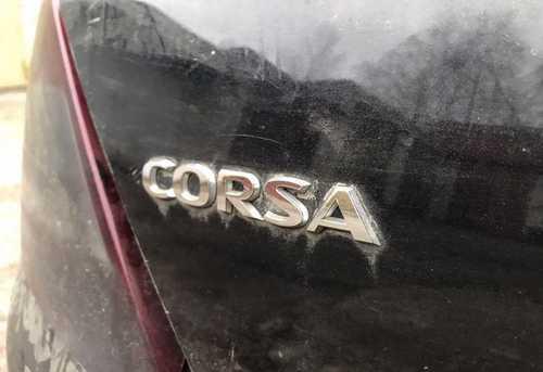 Opel Corsa шильдик шильд на крышку багажника