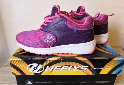 Продам кроссовки на колесиках heelys