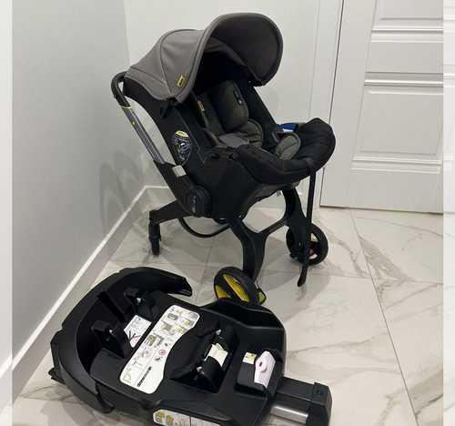 Коляска автокресло doona с базой isofix