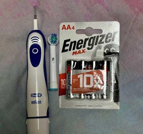 Электрическая зубная щетка oral b