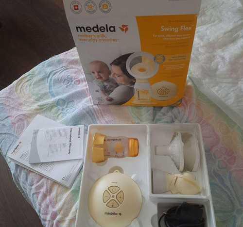 Молокоотсос medela электрический swing flex