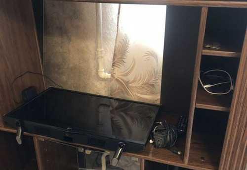 Тумба на колесиках под телевизор