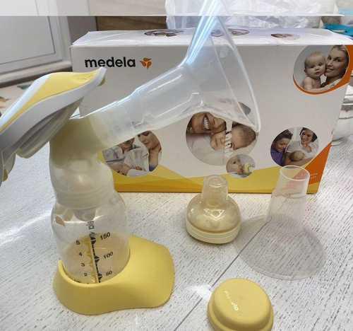 Молокоотсос medela ручной