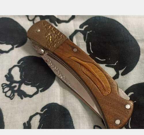Нож