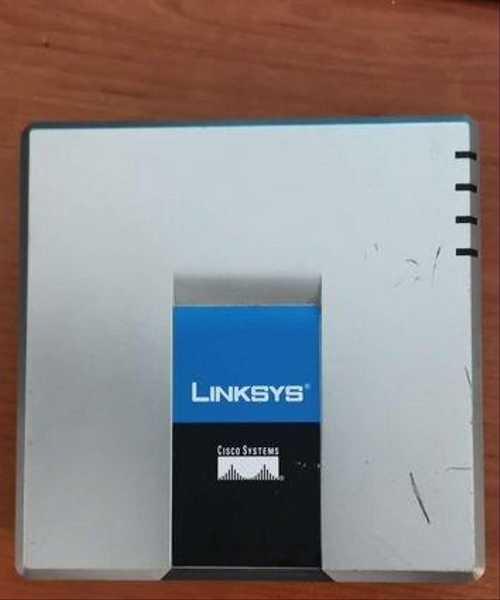 Телефонный адаптер sip Linksys spa2102