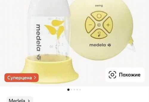 Молокоотсос электрический двойной medela