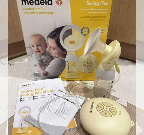 Молокоотсос medela электрический