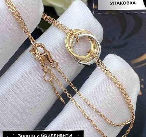 Золотой браслет Cartier Trinity