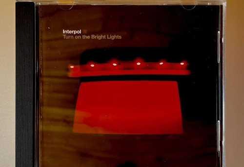 Interpol - Turn On The Bright Light фирменнвй CD