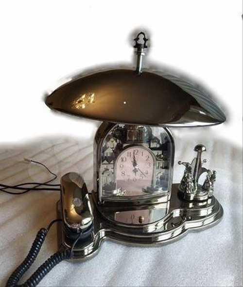 Телефон-светильник с часами и музыкальной шкатулко