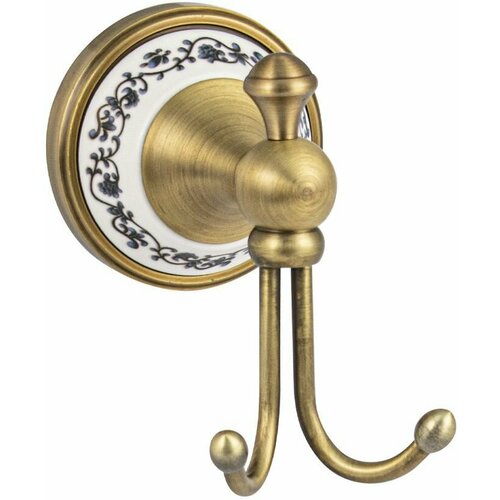 Крючок двойной на основании , цвет бронза , с керамической вставкой с орнаментом .
