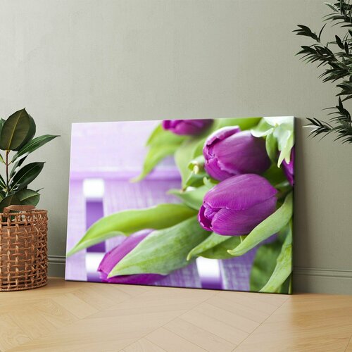 Картина на холсте (Букет фиолетовых тюльпанов на столе) 50x70 см. Интерьерная, на стену.
