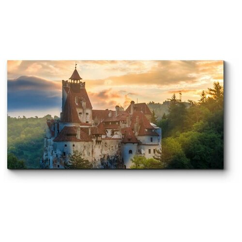 Модульная картина Средневековый замок Дракулы Бран в свете заката60x30