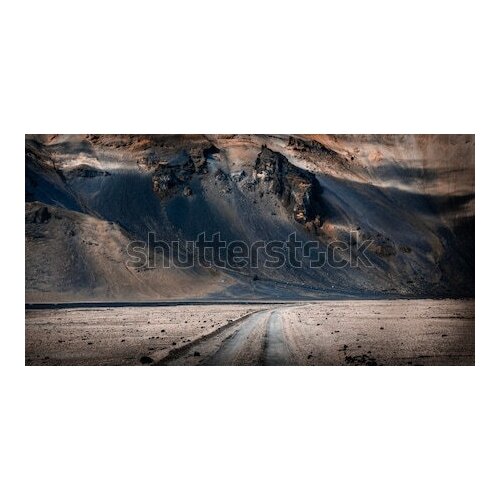 Постер Фантастический пейзаж с высокогорной дорогой в лавовых полях (Исландия) 78см. x 40см.