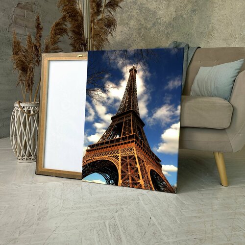 Картина на холсте "Эйфелева башня возвышается над парижем" 50x70 см. Интерьерная, на стену.